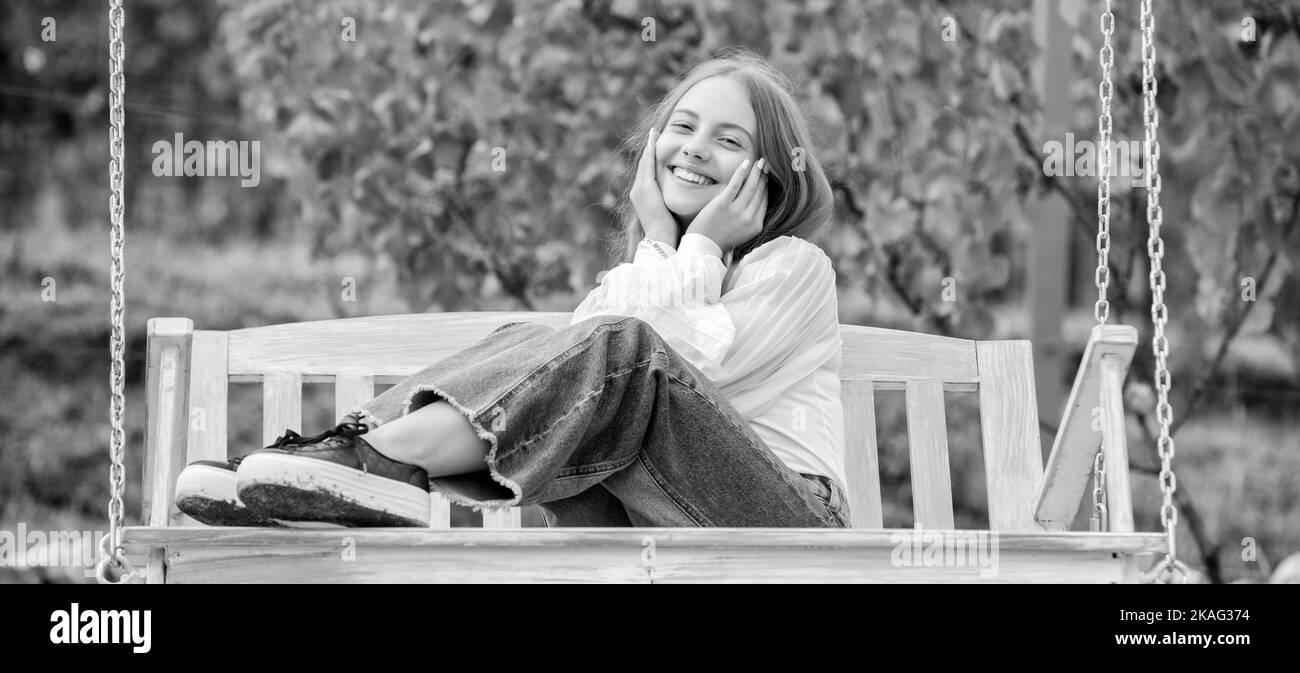 positive child sit on swing outdoor, happiness Stock Photo - Alamy