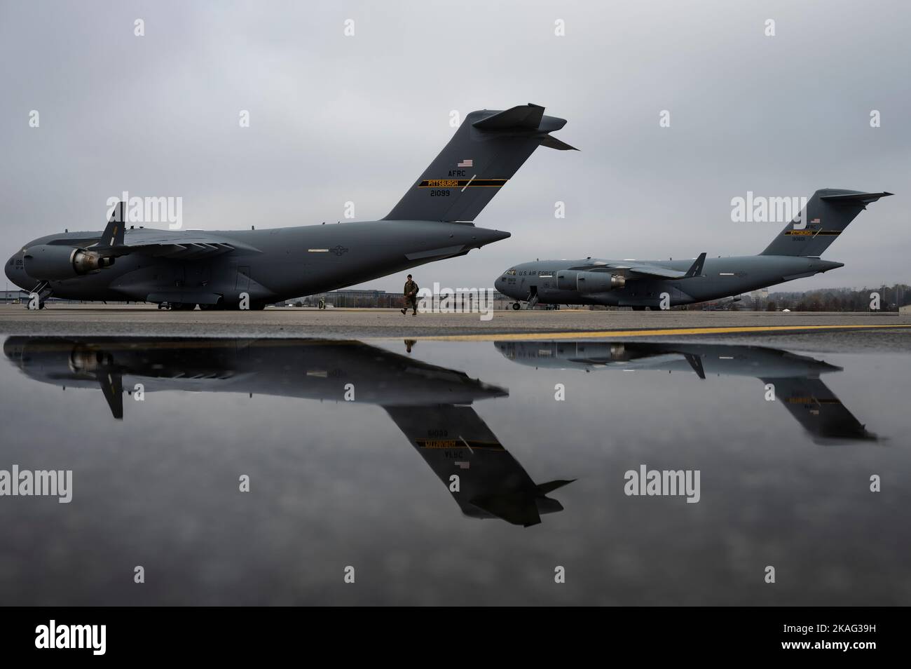 An Airmen assigned to the 911th Aircraft Maintenance Squadron walks ...