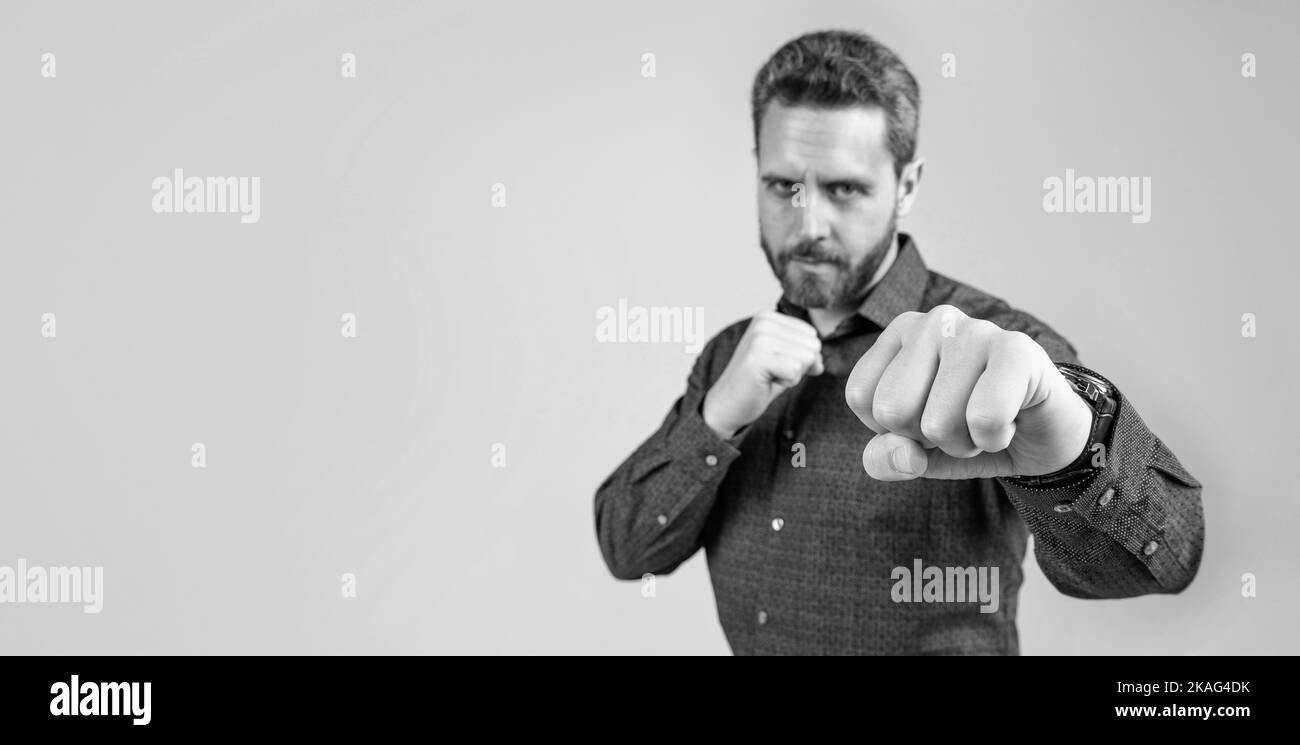 Committed to fighting. Man strike blow with fist selective focus ...