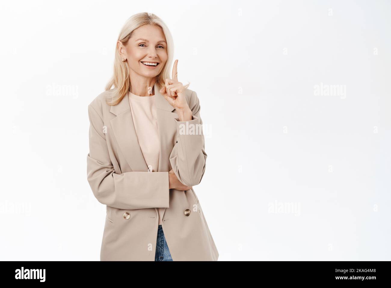 Healthy, stylish senior woman, middle aged lady showing one finger ...