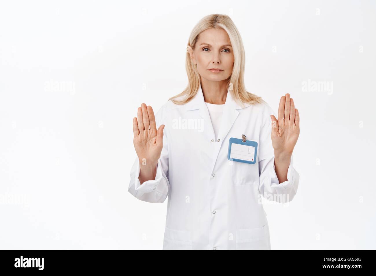 Dont do that. Concerned, serious mature woman doctor, showing ...