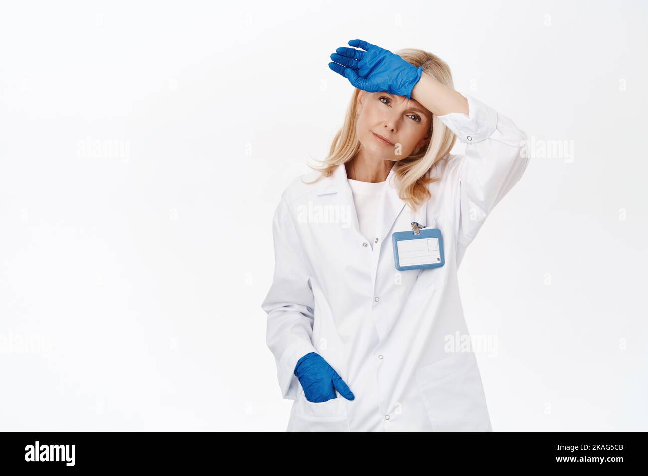 Tired middle aged female doctor hi-res stock photography and images - Alamy