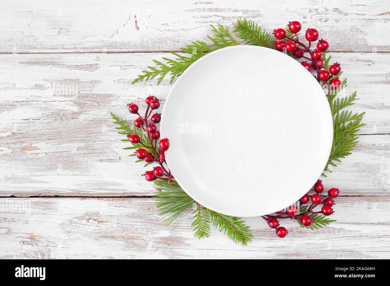 Christmas or winter table setting mock up. Blank white plate with frame ...