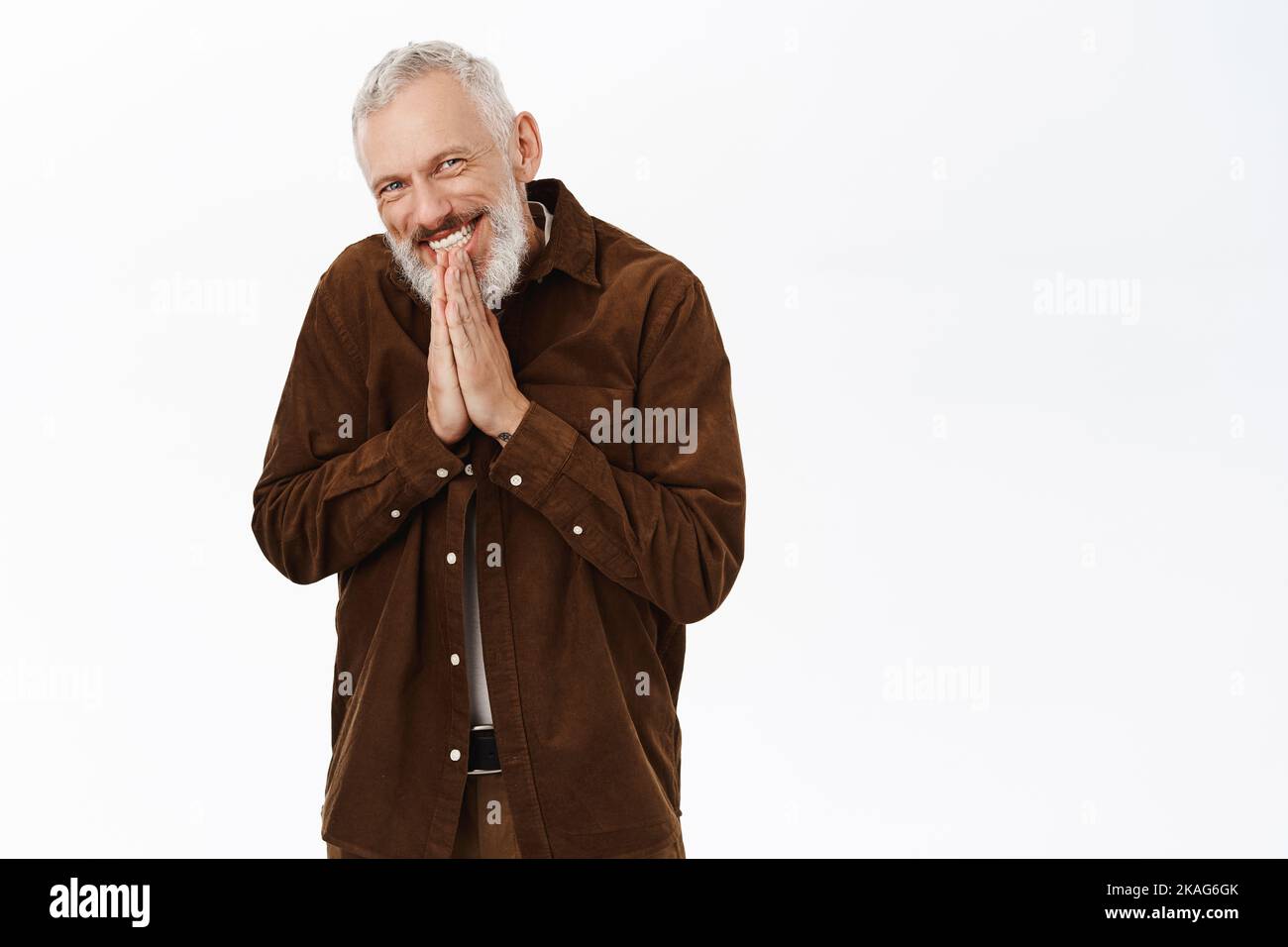 Please. Handsome old guy, senior man showing begging gesture, asking ...