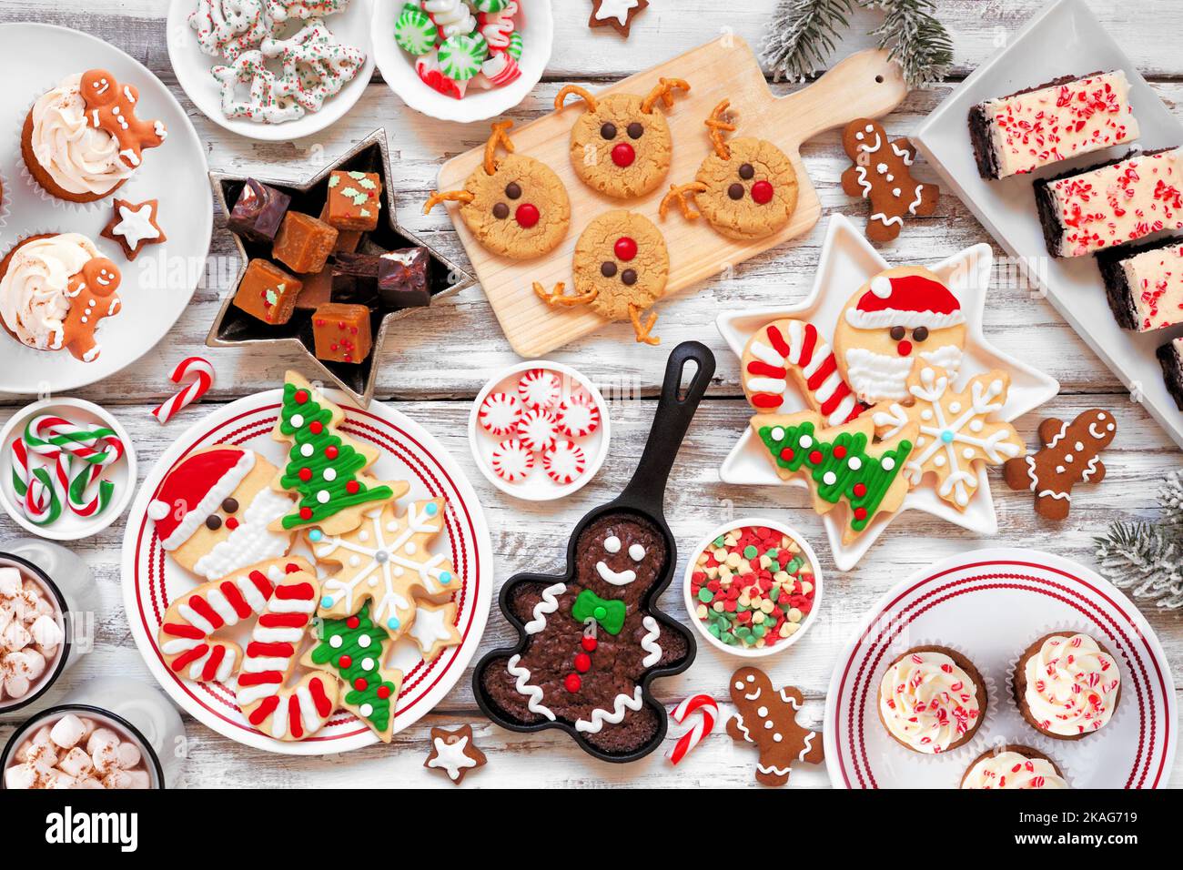 Cute Christmas sweets and cookie table scene. Top down view over a ...