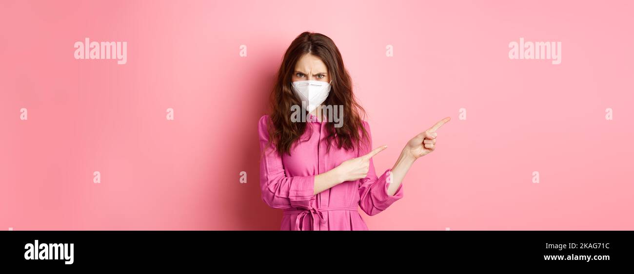 Covid-19, quarantine and social distancing concept. Angry woman ...