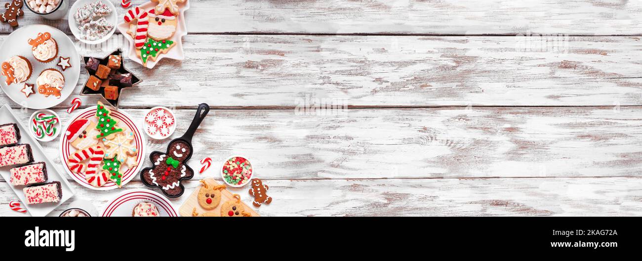 Cute Christmas sweets and cookie corner border. Above view over a ...