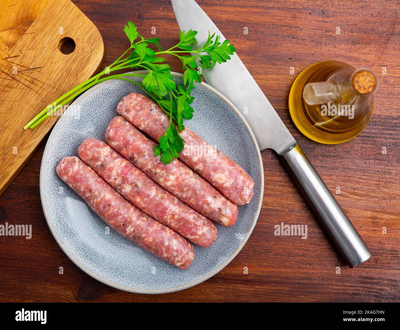 Delicious butifarra on plate with herbs and olive oil Stock Photo - Alamy