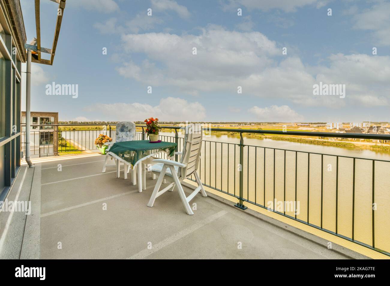 Sitting area in balcony with comfortable furniture around beautiful ...
