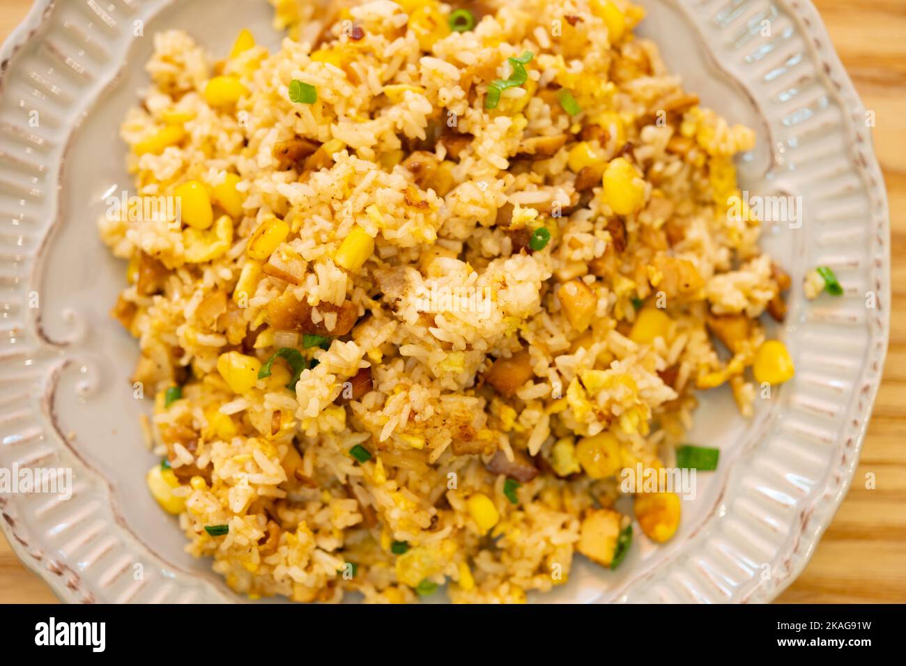 top view dish of diced chicken and maize and fried rice Stock Photo - Alamy