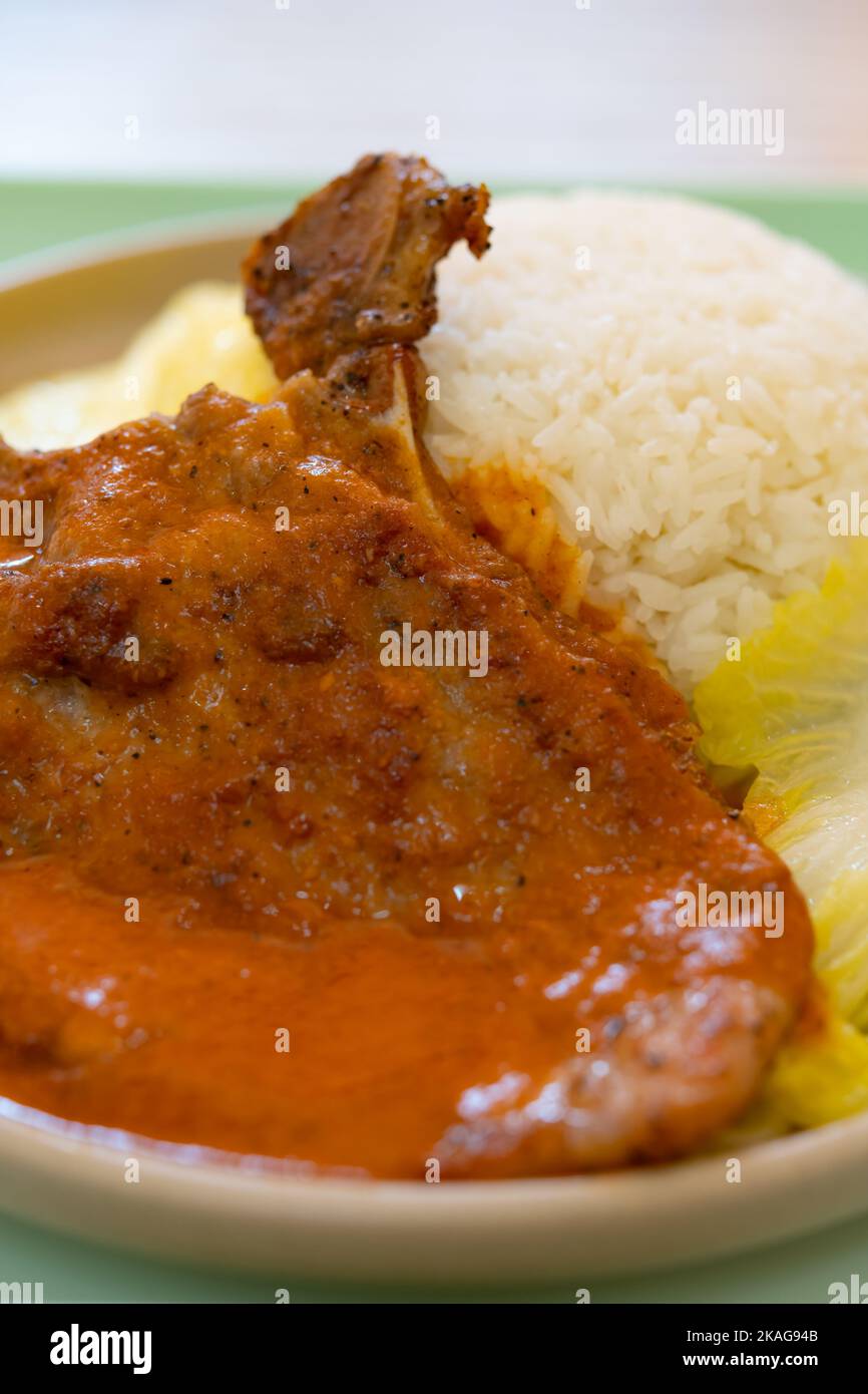 angle view dish of pork rib with egg and cabbage and rice vertical ...