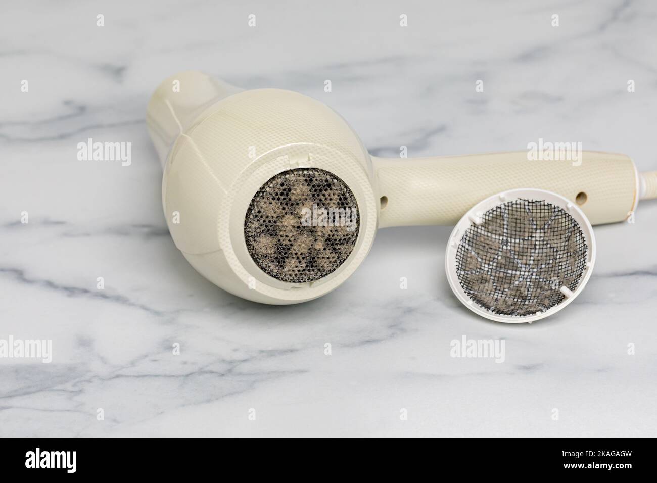 Hair dryer air filter dirty with lint. Blow dryer safety, maintenance ...