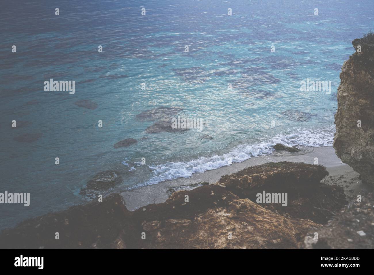 Typical beach with sand and rocks in the Italian coast Stock Photo - Alamy
