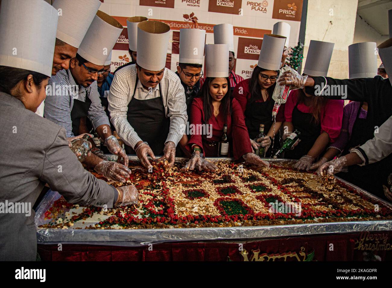 Kolkata, West Bengal, India. 2nd Nov, 2022. Cake mixing ceremony, large ...