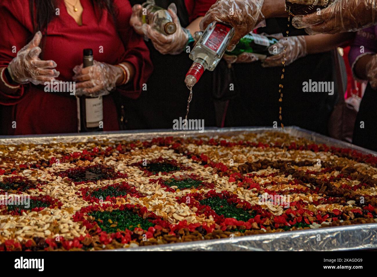 Kolkata, West Bengal, India. 2nd Nov, 2022. Cake mixing ceremony, large ...