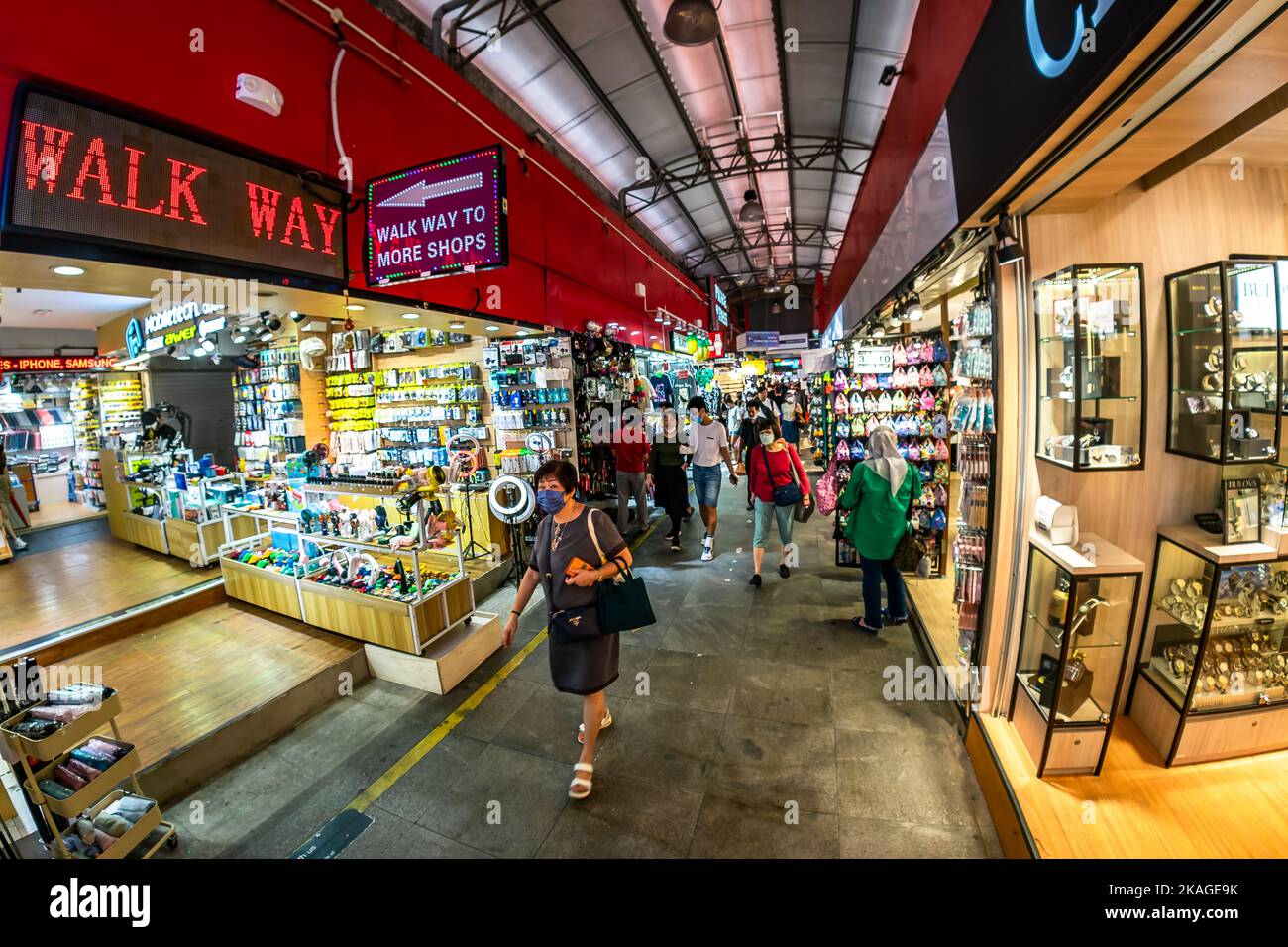 Bugis Street market is a popular tourist destination, and is close to ...