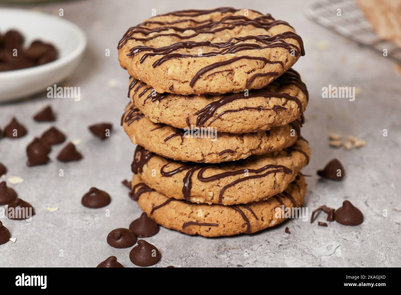 banana oatmeal cookies with chocolate chips, bananas in background ...