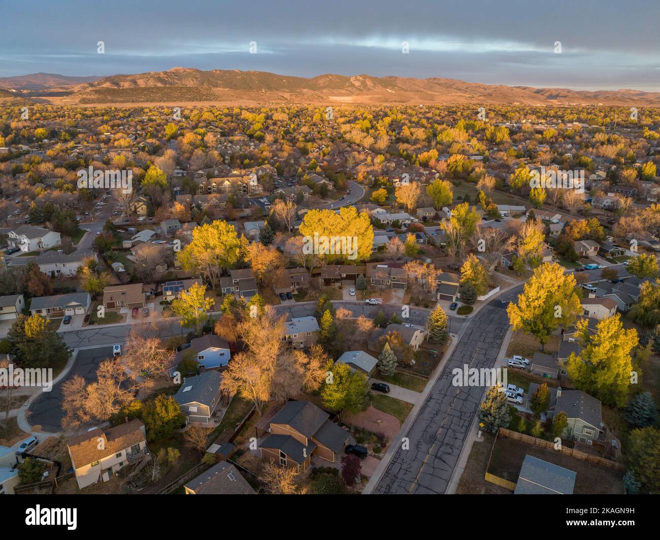October dawn over Fort Collins and foothills of Rocky Mountains in ...