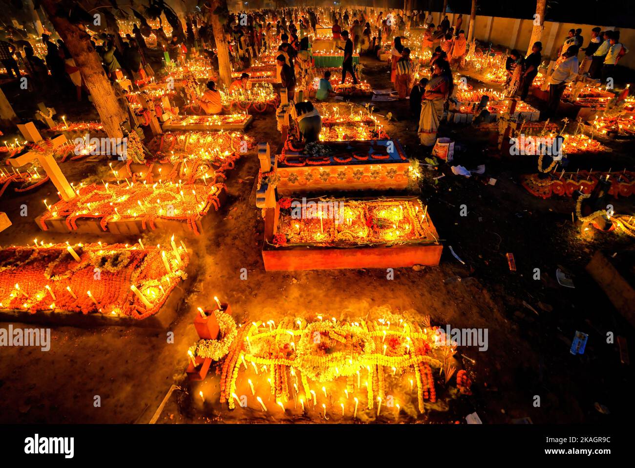 Nadia, India. 02nd Nov, 2022. Graves seen well decorated with flowers ...