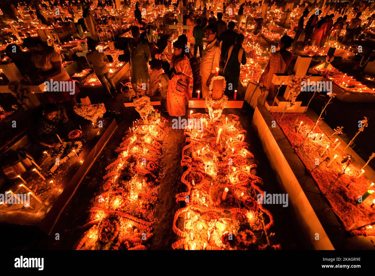 Nadia, India. 02nd Nov, 2022. Graves seen well decorated with flowers ...