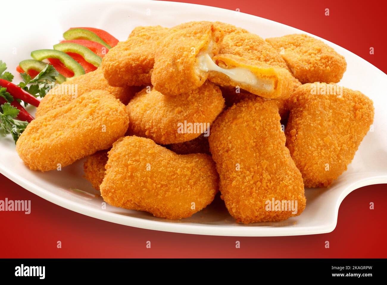 Fried chicken nuggets and sauce, isolated on light gray Stock Photo - Alamy