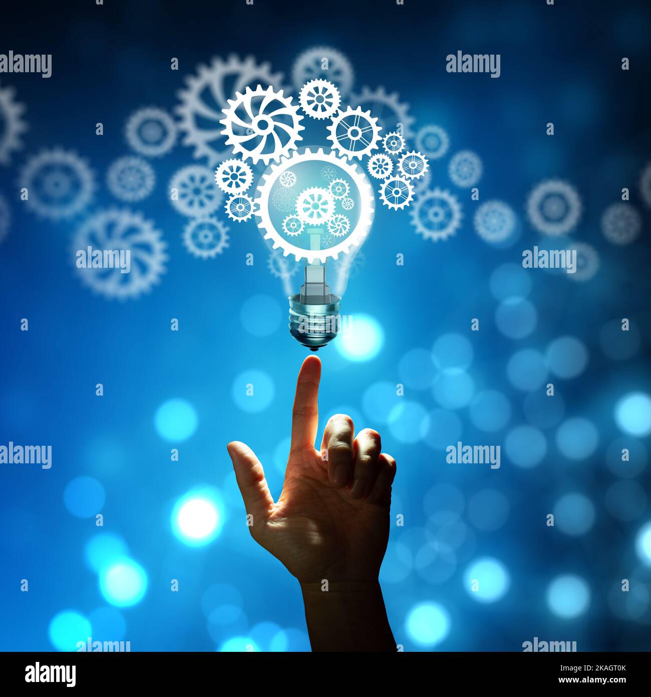Hand holding Creative light bulb with cog inside and technology ...