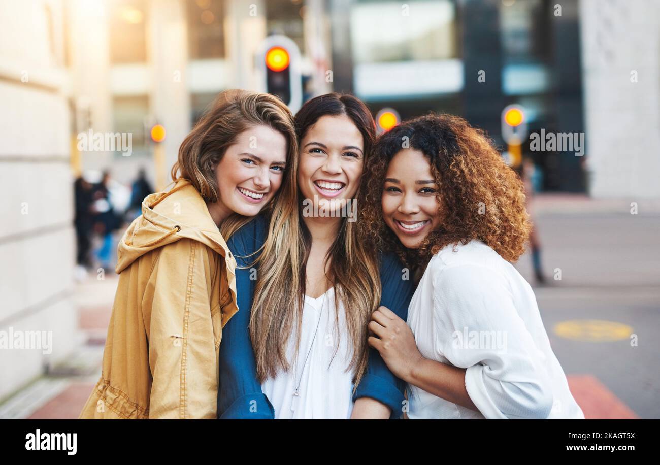 Three beautiful friends authentic in hi-res stock photography and ...