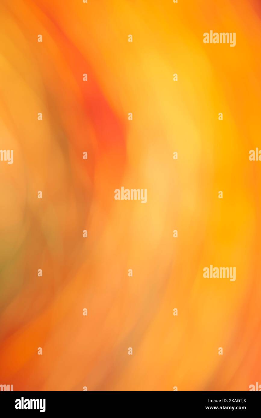 Artistic abstract warm background in vivid orange and yellow colors ...