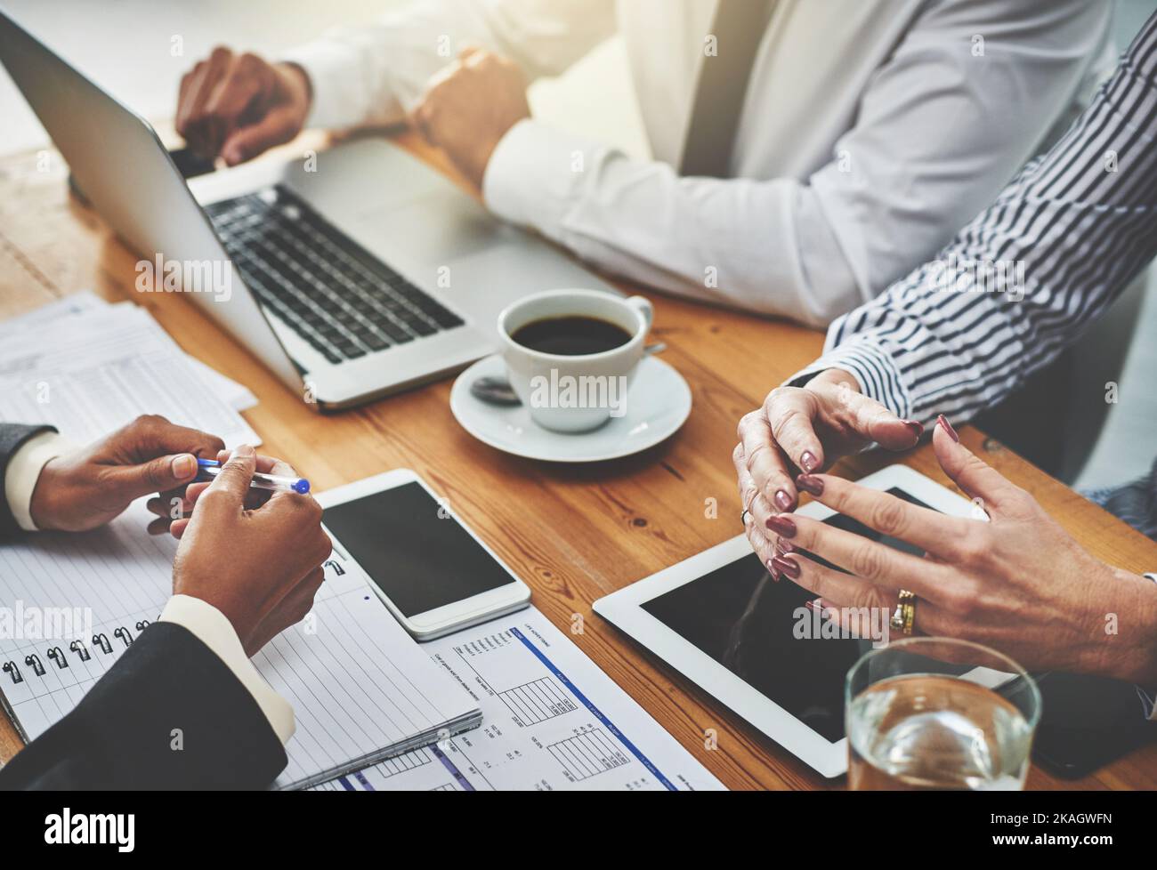 Getting down to the real work behind success. a group of unrecognisable ...