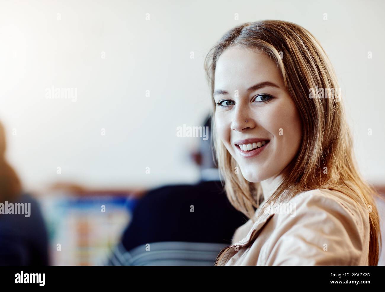 I studied all night. Portrait of a young cheerful university student ...