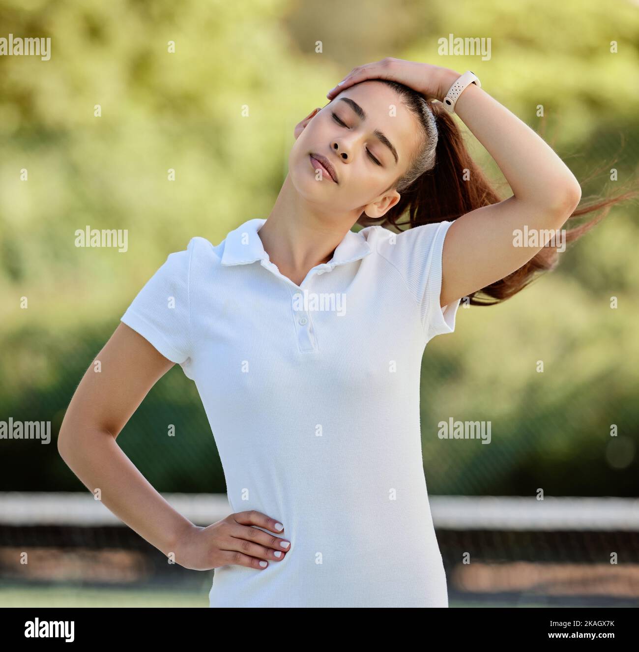 Woman, tennis and stretching neck, exercise and training on court for ...