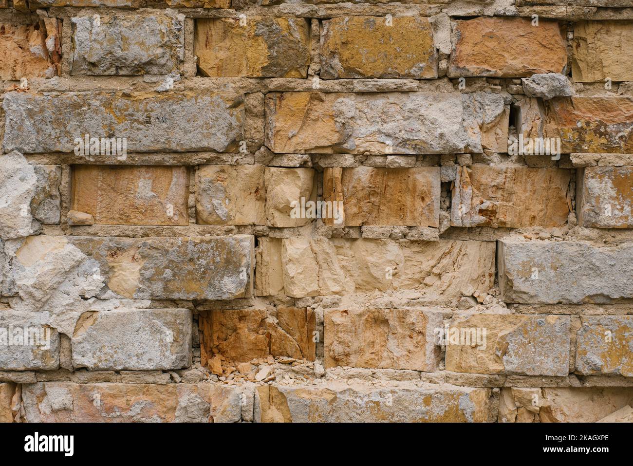 Old brick wall made of destroyed bricks Stock Photo - Alamy