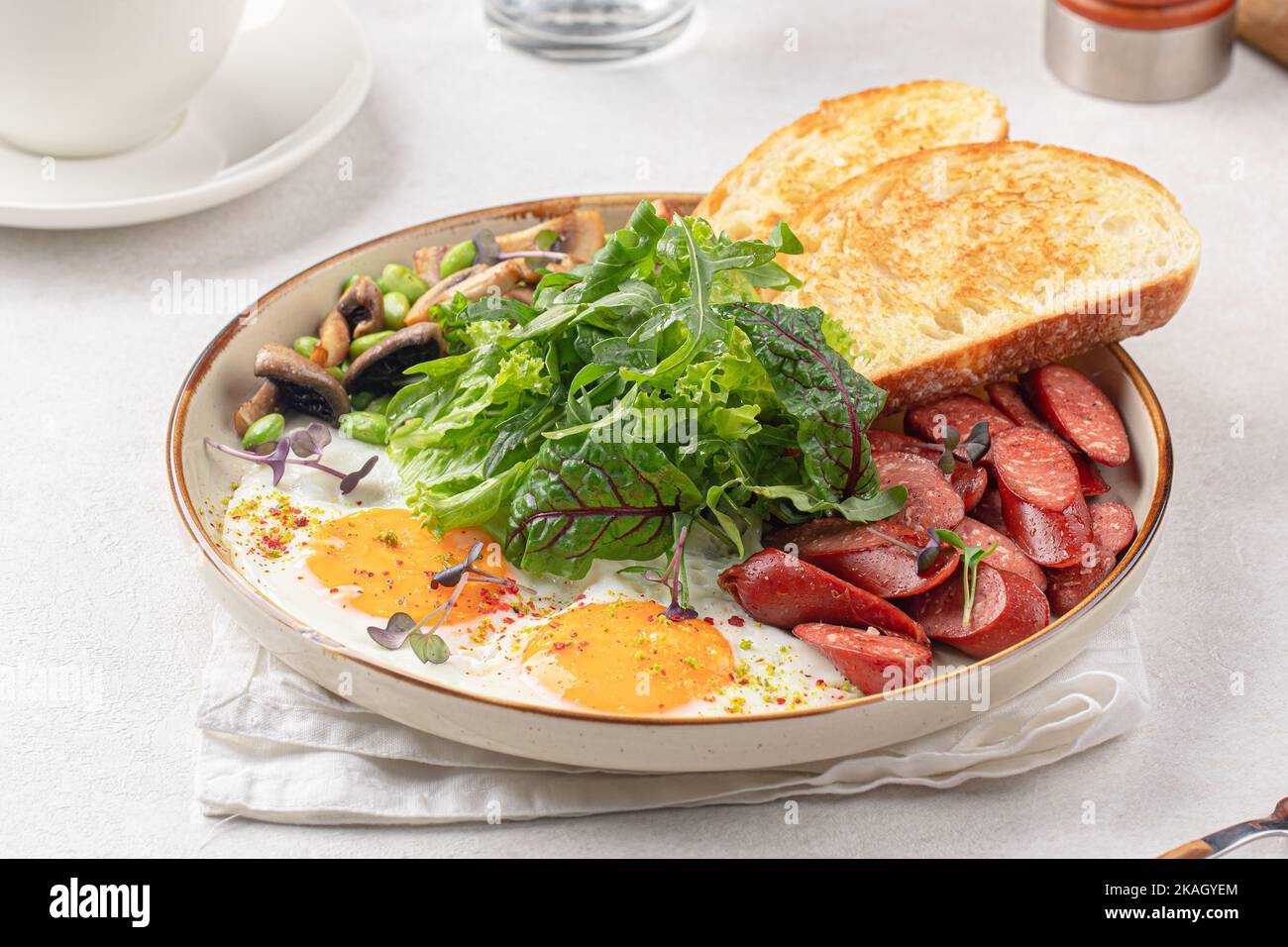 Classic english breakfast with fried eggs Stock Photo - Alamy