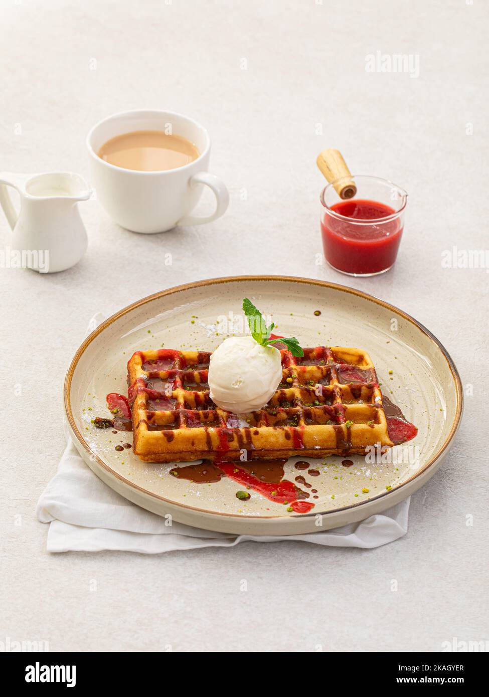 Portion of sweet belgian waffles with ice cream Stock Photo - Alamy