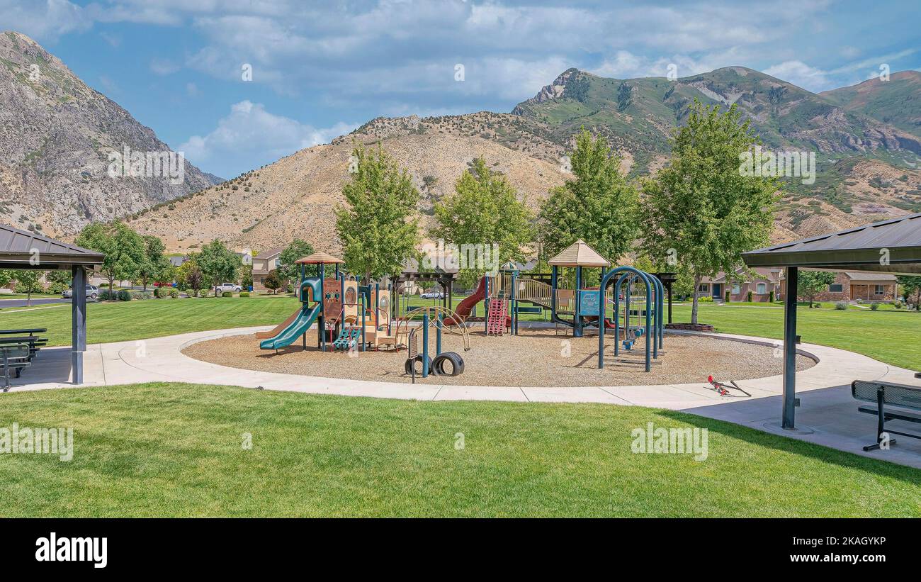 Panorama White puffy clouds Public park at Utah Valley with playground ...