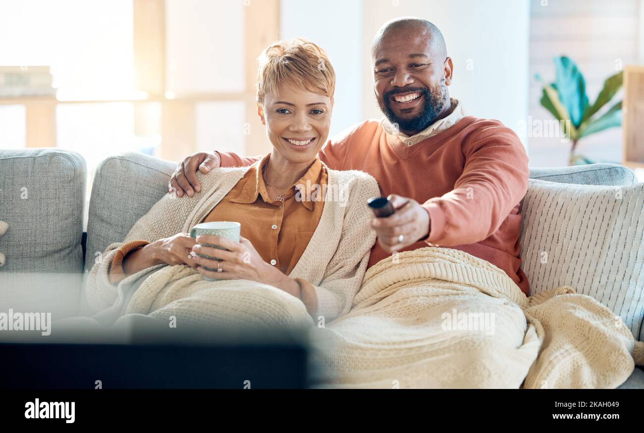Mature couple watching tv, news and movie, cable show and media ...