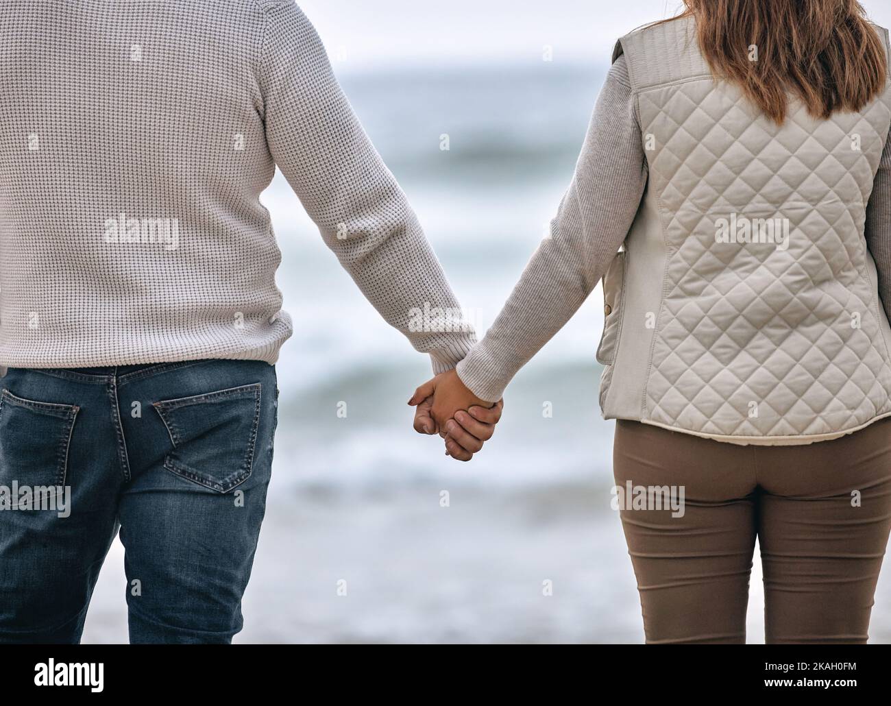 Couple, holding hands and beach in travel, love or romance for ...