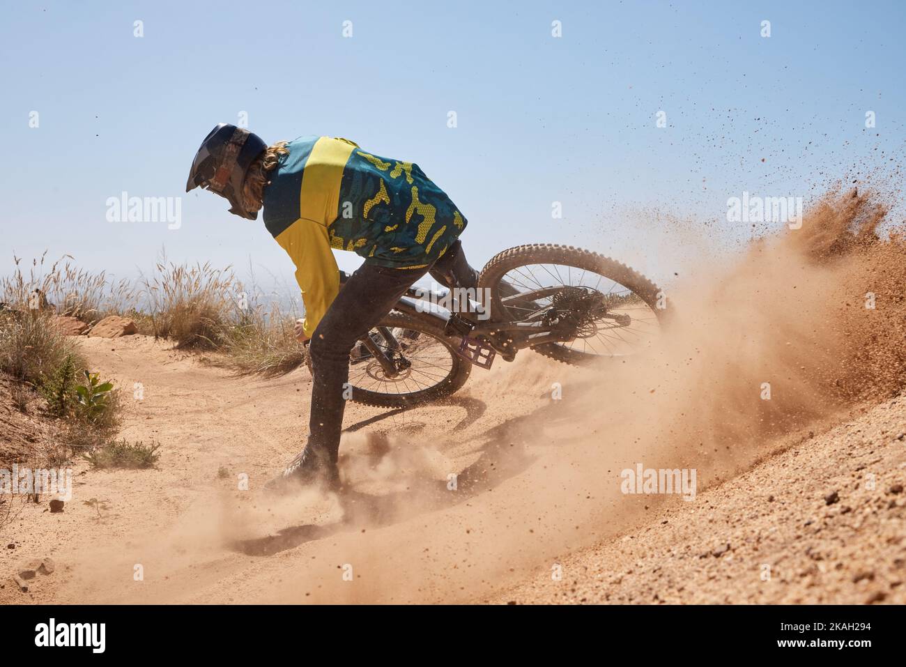 Mountain bike, dust and man cycling on dirt path for action, speed and ...