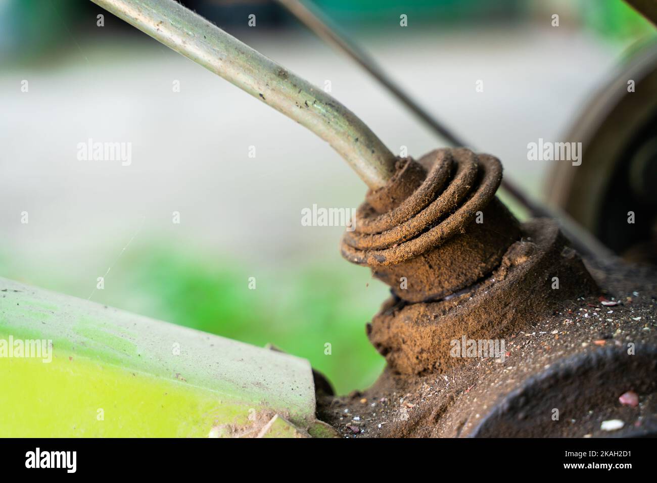 Gear lever on a walk-behind tractor close-up on a blurred background ...