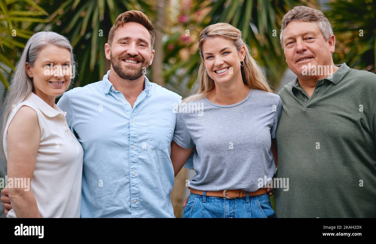 Big family, bonding and portrait in garden while embracing for love ...
