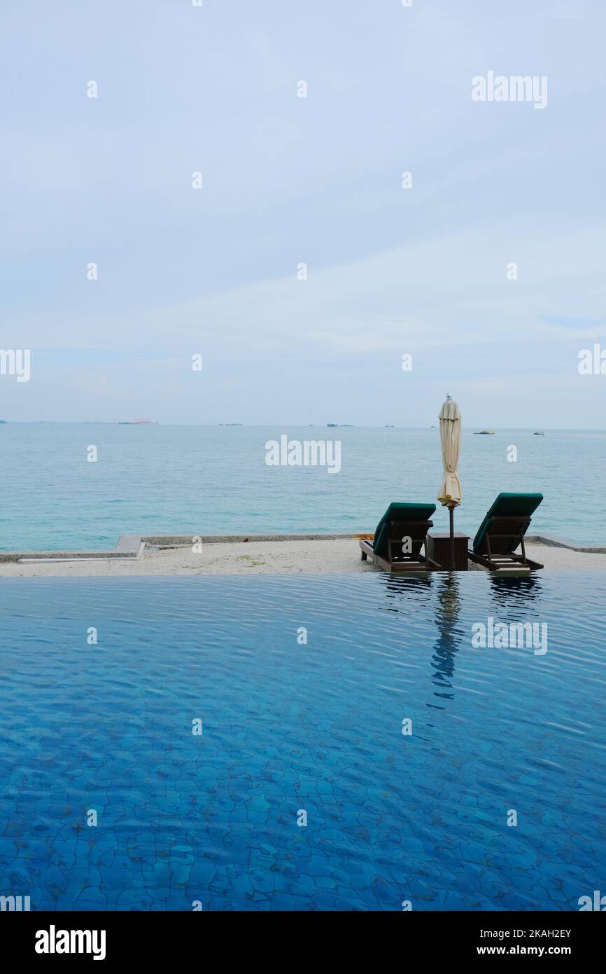 Beautiful infinity pool overlooking Pangkor laut island Stock Photo - Alamy
