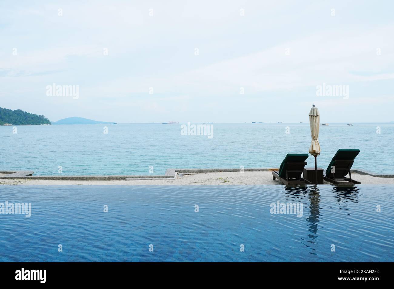 Beautiful infinity pool overlooking Pangkor laut island Stock Photo - Alamy