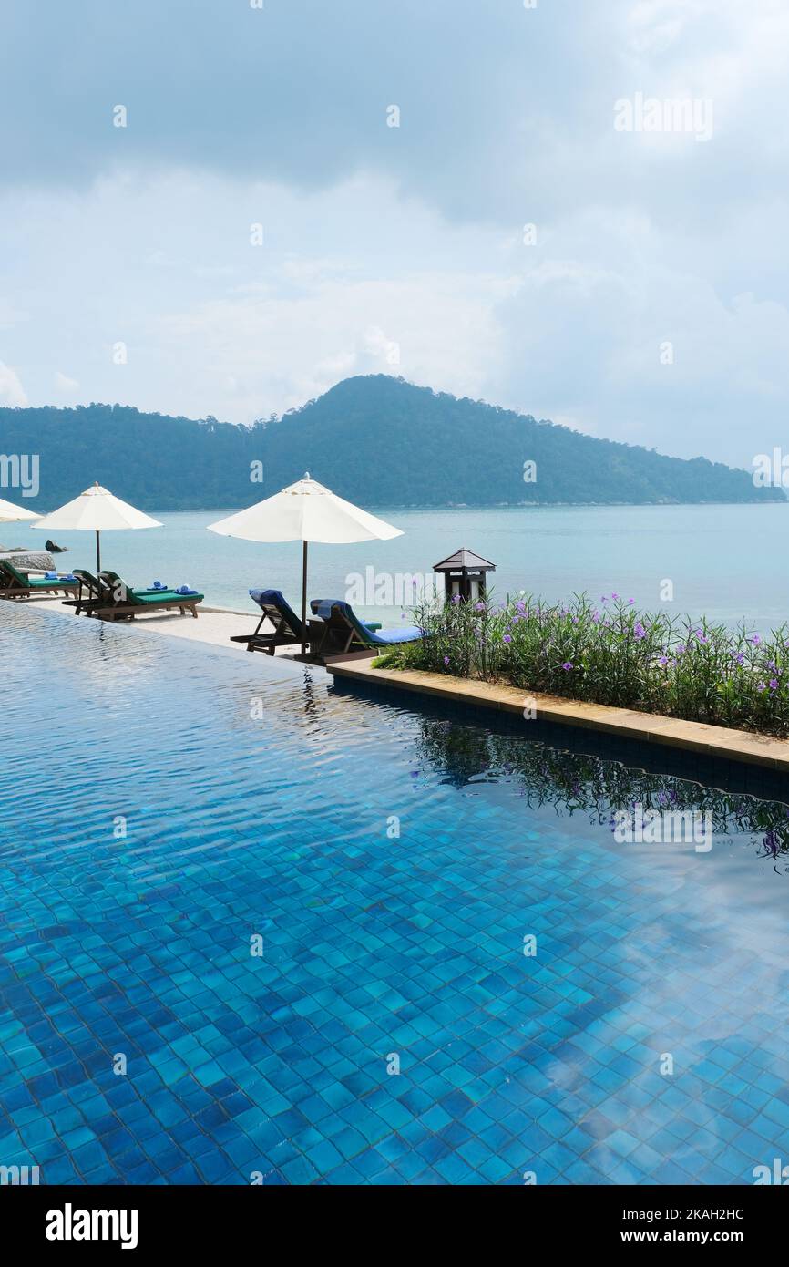 Beautiful infinity pool overlooking Pangkor laut island Stock Photo - Alamy