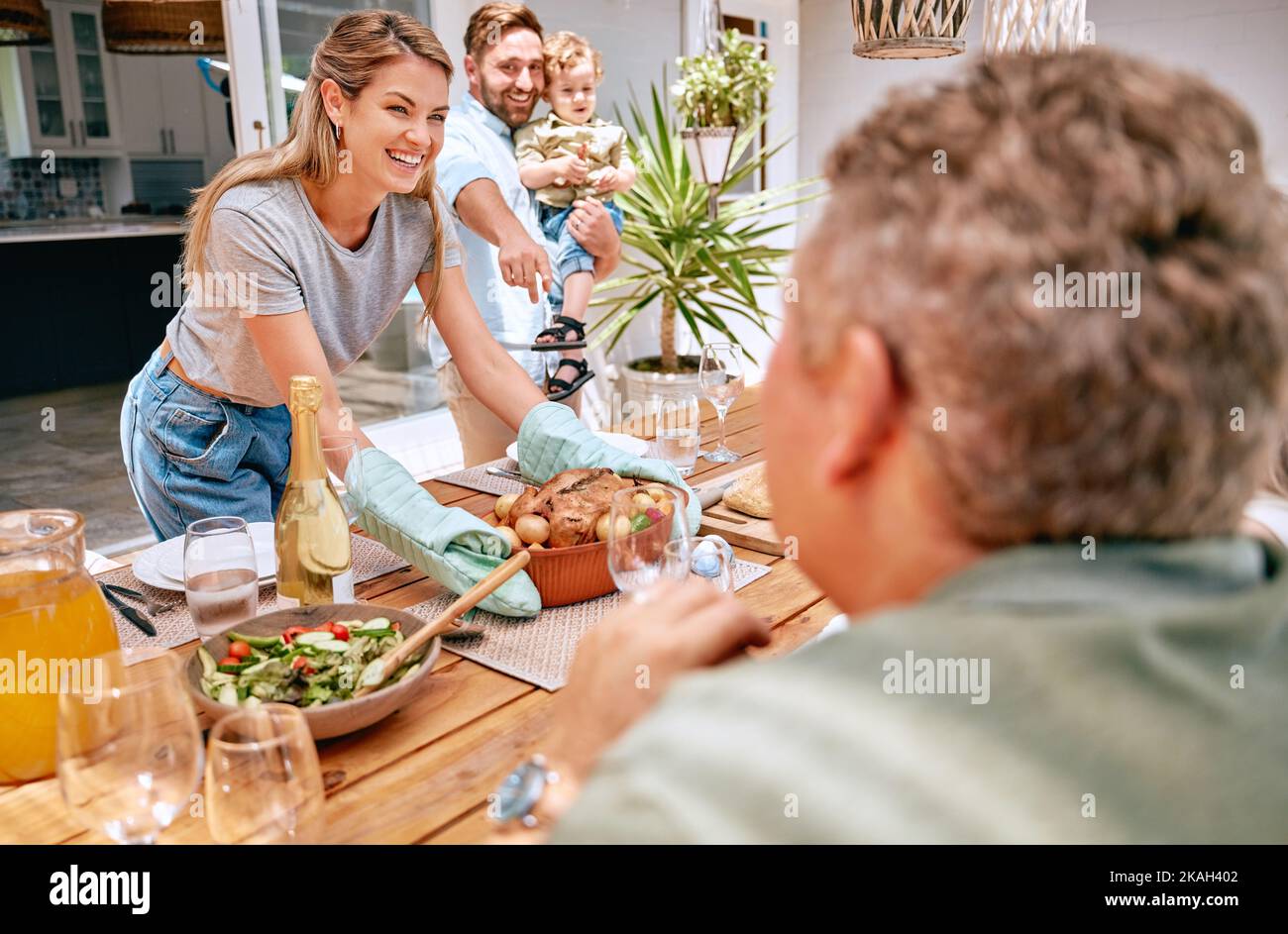 Thanksgiving, celebration and family serving food, having lunch ...