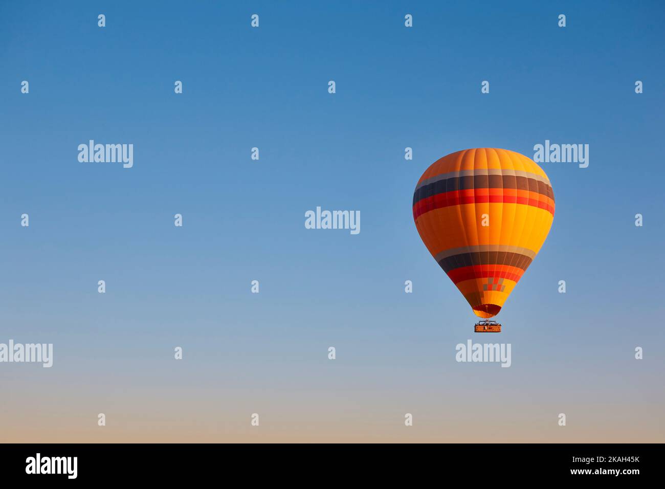 Balloon at dusk in Cappadocia. Spectacular flight in Goreme. Turkey ...