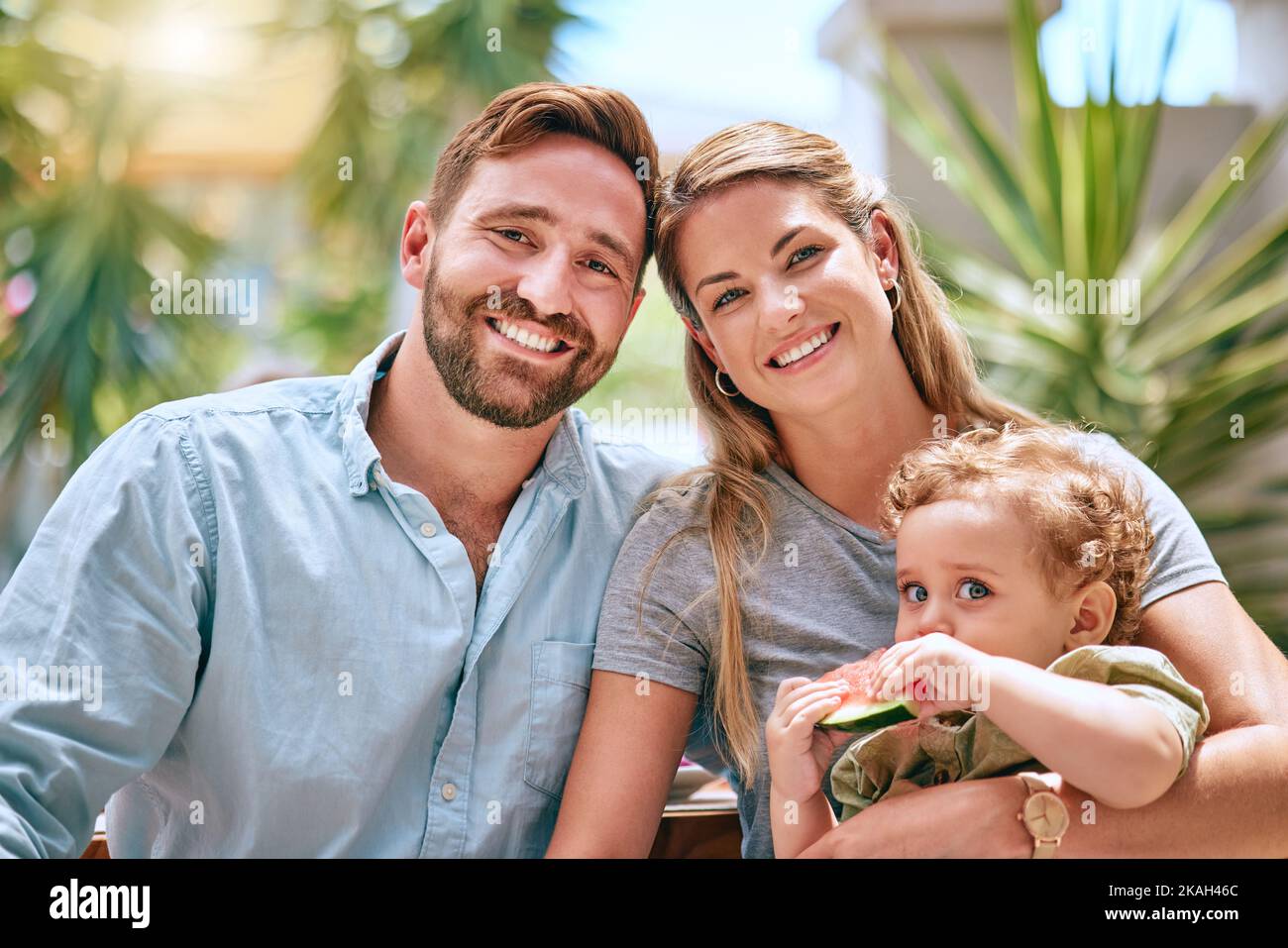 Family, parents and portrait of child with watermelon enjoying summer ...