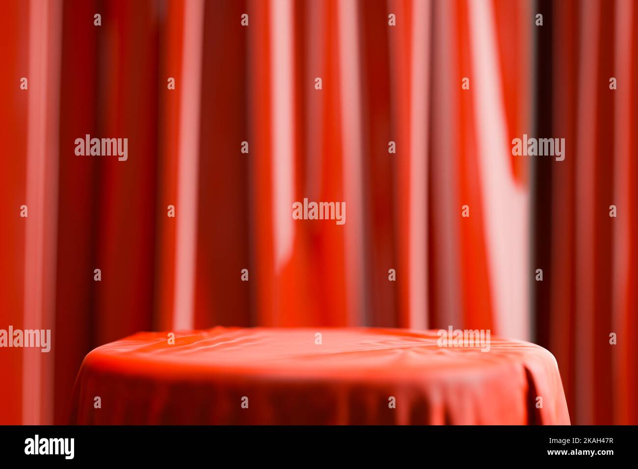 Product placement. Bright red silky fabric with shiny waves and a round ...