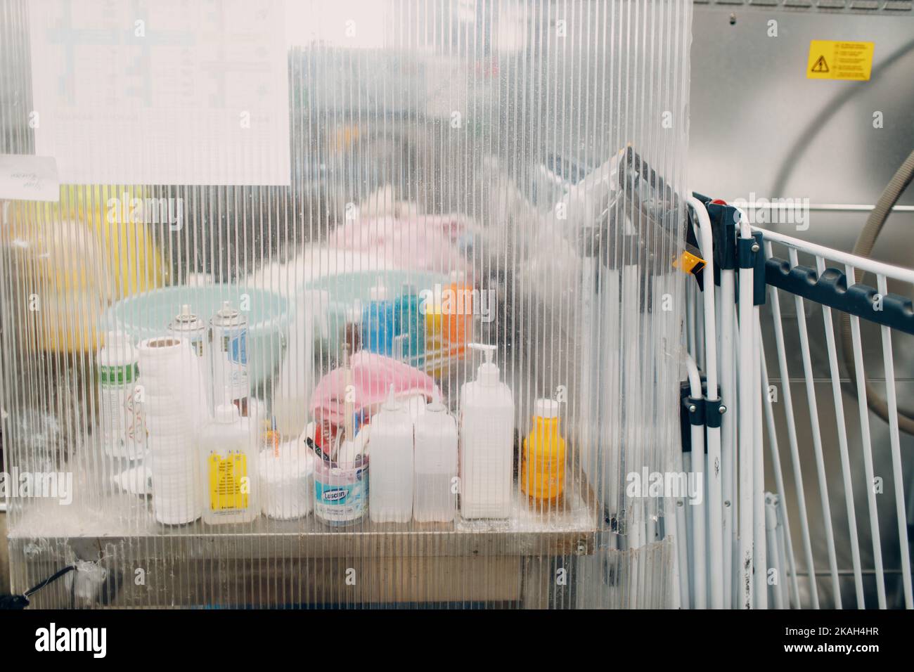 Dry cleaning clothes. Clean cloth chemical process. Laundry industrial ...