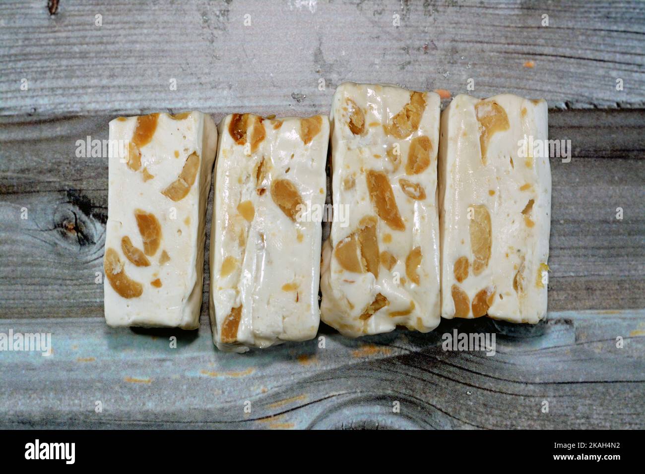 Pieces of Arabic sweet delicious Noga with peanuts,Egyptian cultural ...