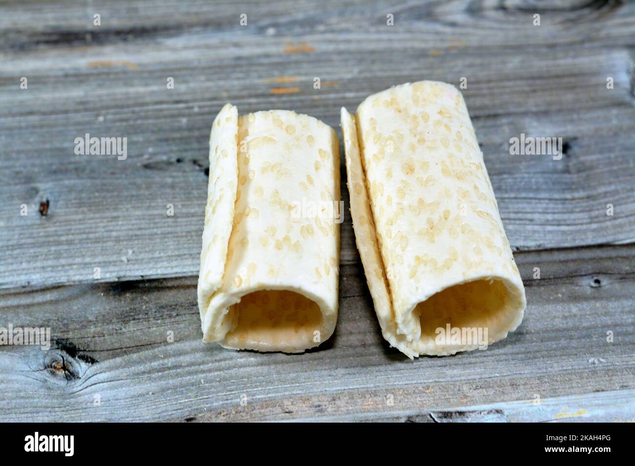 Rolled Egyptian festive thin candy covered with sesame, Egyptian ...
